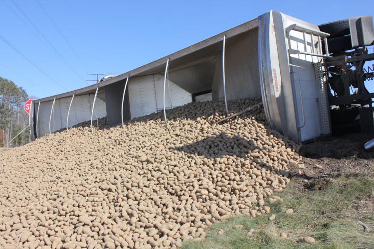 Tater truck takes tumble spilling the goods into ditch | Subscriber ...