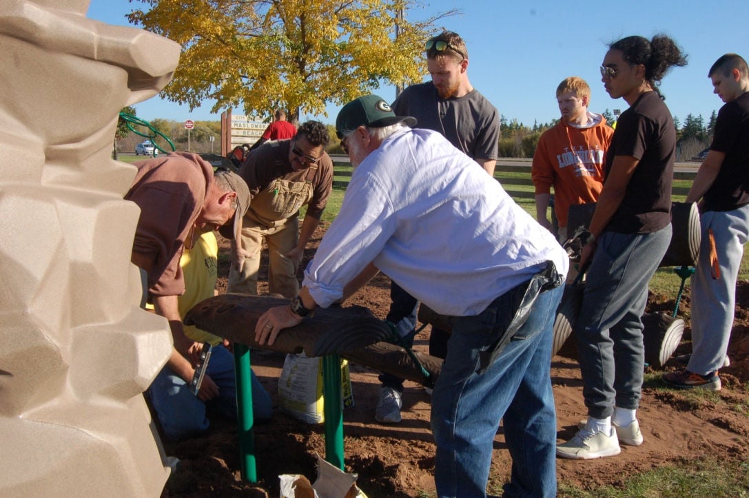 Maslowski Beach playground installation | Ashland Daily Press | apg-wi.com