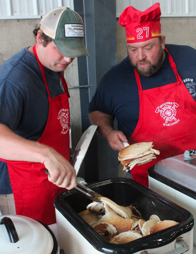 Breakfast is served! Spooner firemen treat public to pancake and ...