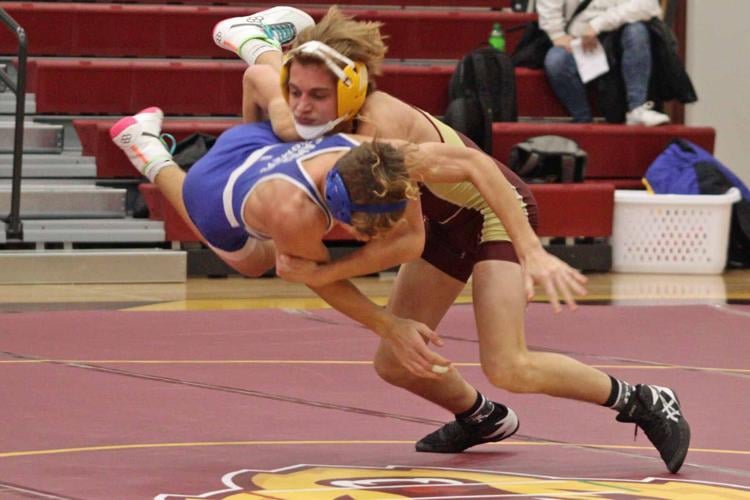 Prep wrestling: Cameron earns win over Golden Bears at Barron quad ...