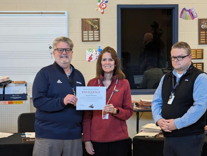 Staff, student recognized by School Board | Local | apg-wi.com