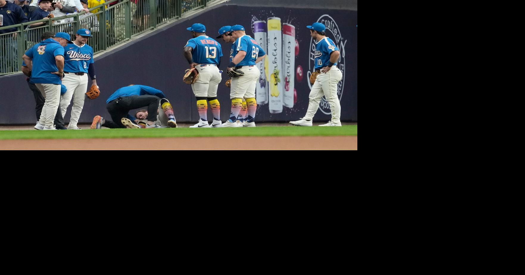 Brewers outfielder Brandon Lockridge carted off field after crashing ...