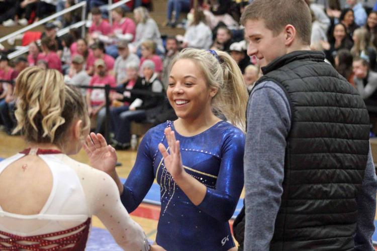 Gymnastics: Rice Lake's Ash sets beam record, repeats on vault to win ...