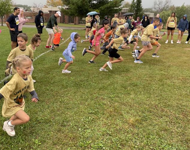 Running in the rain: 14th annual Forrest Run raises funds for brain ...