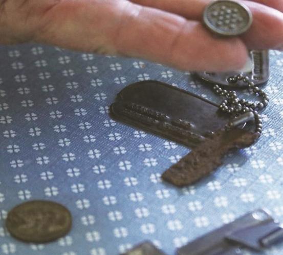 Family reunited with vet's long-lost dog tags | | apg-wi.com