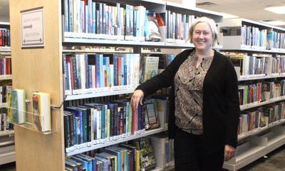 New library director said position was 'an opportunity I couldn't pass ...