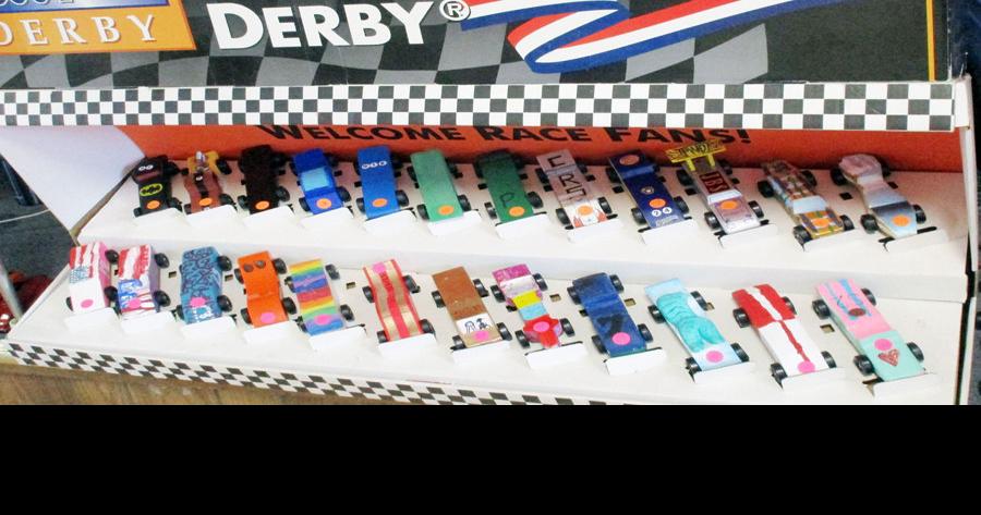 Waving the checkered flag, scouting style, at Pinewood Derby | Free ...