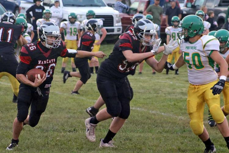 Prep football: Belongia earns all-region honors on offense and defense ...