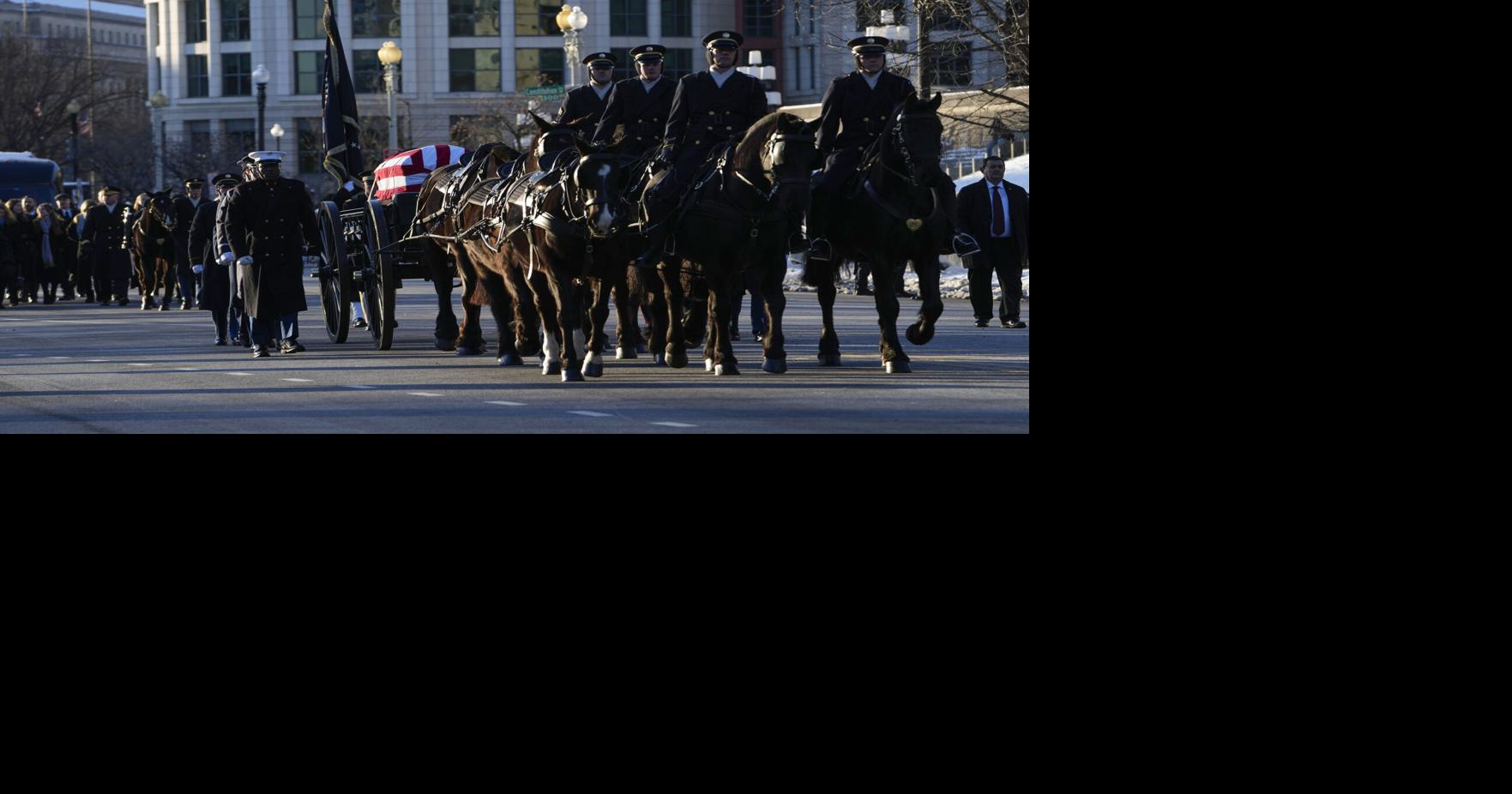 Jimmy Carter's casket arrives at the US Capitol, where he will lie in ...