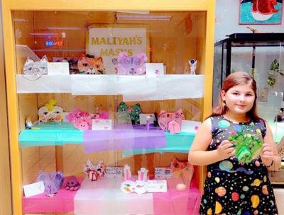 Mask artist shows work at library | Price County Review | apg-wi.com