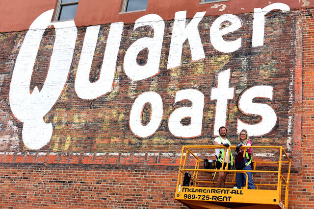 Hidden history rediscovered: Work begins on restoring Quaker Oats mural ...