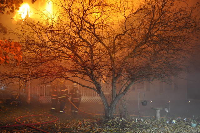 Area firefighters battle house fire | Corunna | argus-press.com