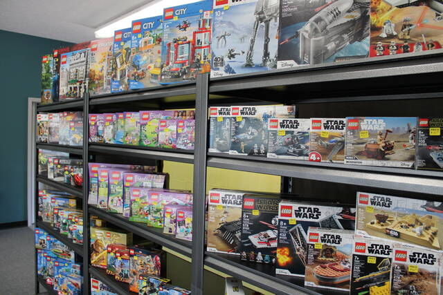 Commissioners, under fire for COVID pay, launch Lego store ...