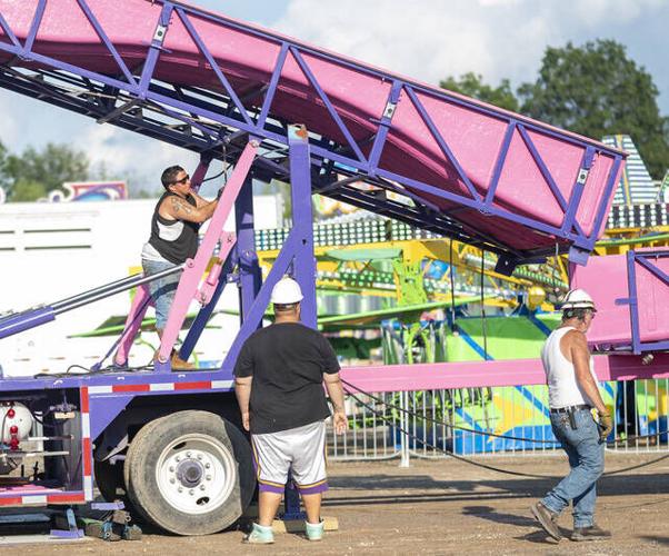 After strenuous setup process, carnival rides make debut at Fair ...