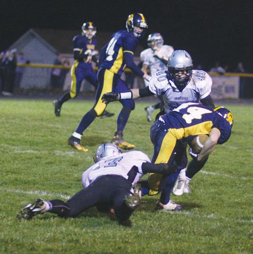 FOOTBALL: Ovid-Elsie shut out in second half, lose 41-21 to Lansing ...