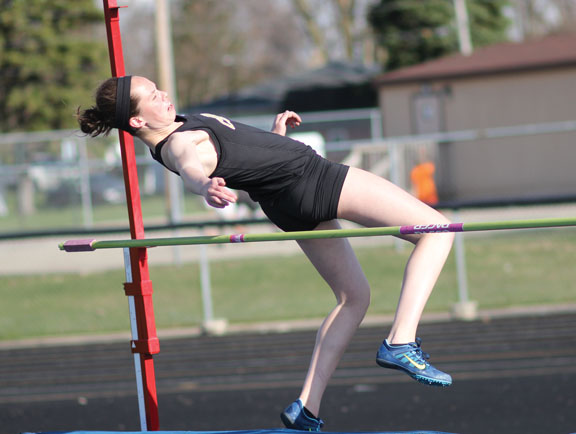 Getting over the hump; Corunna boys, girls get past Lansing Catholic ...