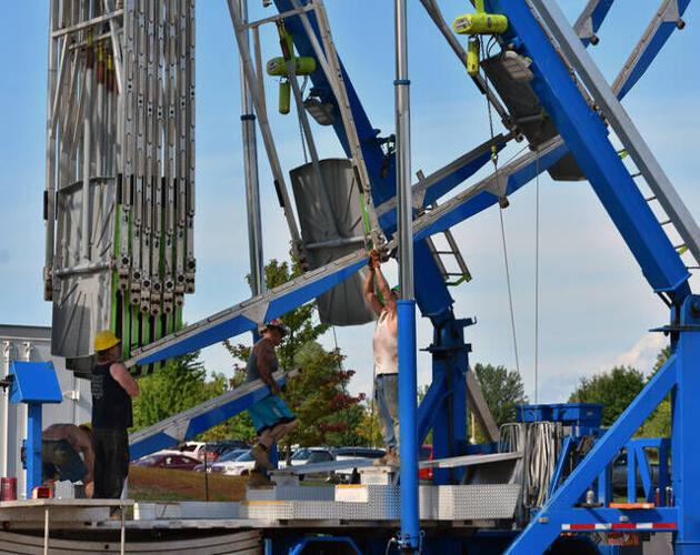 After strenuous setup process, carnival rides make debut at Fair | Local News | argus-press.com