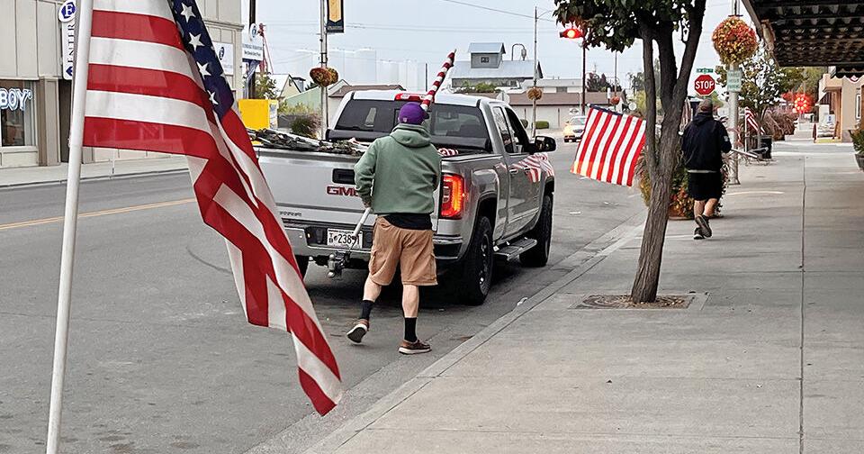 Filling sidewalks with flags for Patriot Day | Valley Life ...