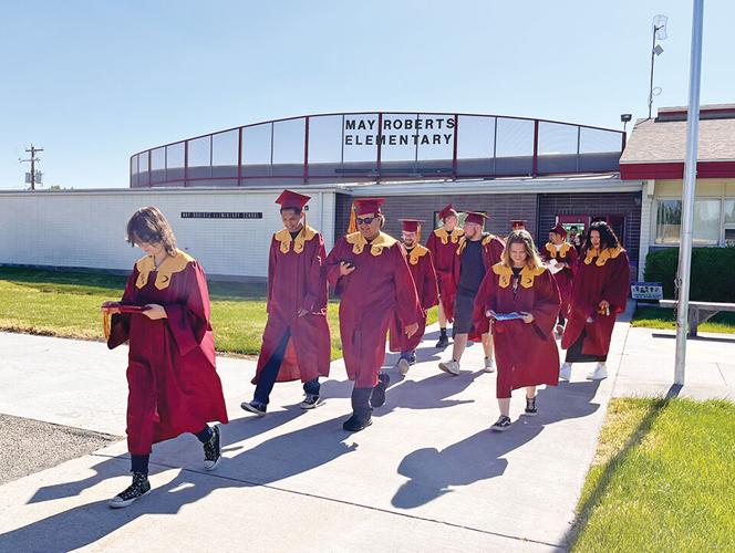 Graduates hit the gym while visiting May Roberts Elementary School ...