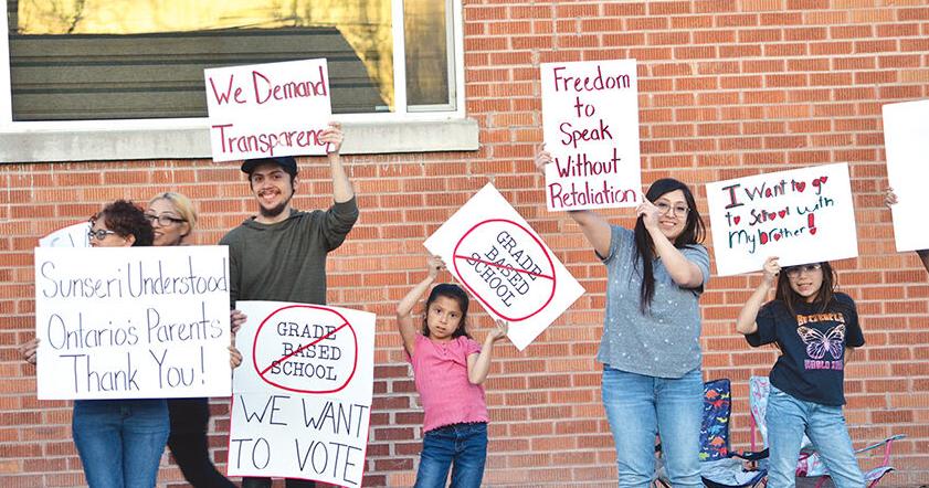 In-depth: Parents, children protest grade-based K-5 schools | Local ...