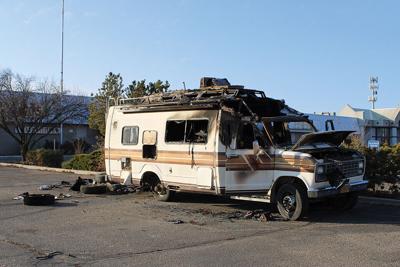 Tow company removes burnt-out RV from West Park Plaza | Local News ...