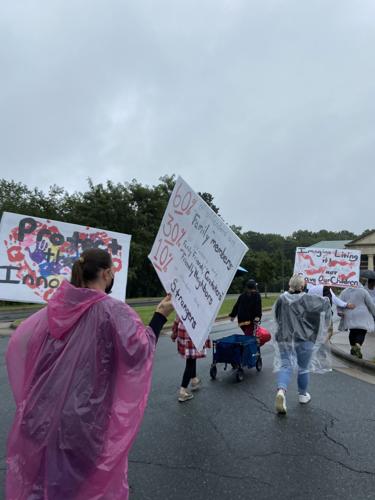 Community members march to 'Save Our Children' | Community ...