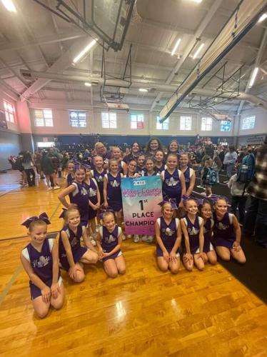 Third and fourth grade cheerleaders win competition | Sports ...