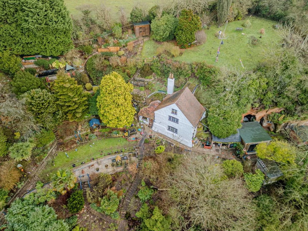 16th-century cottage built in a cave on sale for $700,000 | National ...