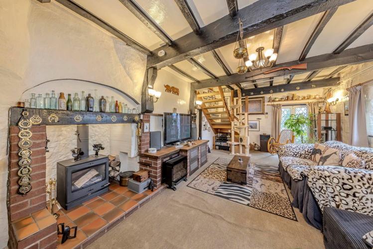 16th-century cottage built in a cave on sale for $700,000 | National ...