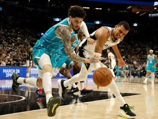 Lakers edge Nuggets in OT while Wemby sparks Spurs win | National ...