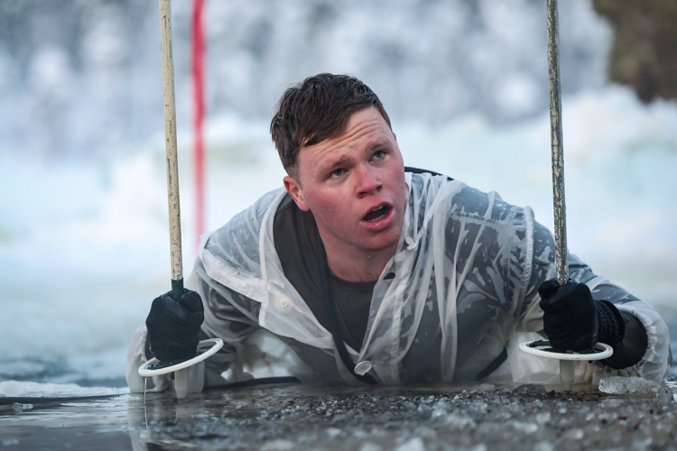 British troops plunge into icy Arctic waters as tensions rise over ...