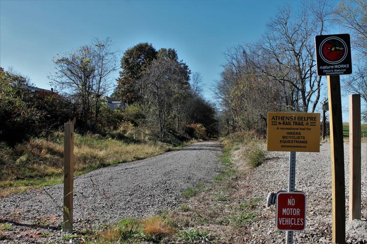 Locals walk on and address concerns about Athens-Belpre Rail Trail ...