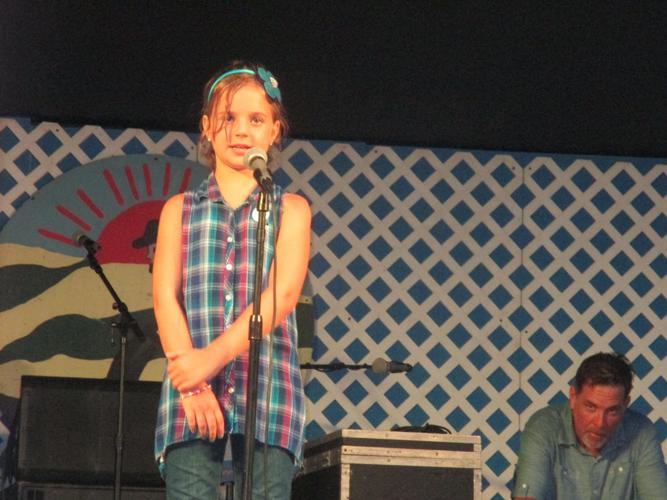First-grader recites 32-line poem during Old Settlers talent show ...