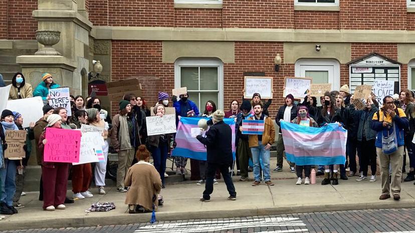 About 100 protest Artifacts for transphobic signage, business practices ...