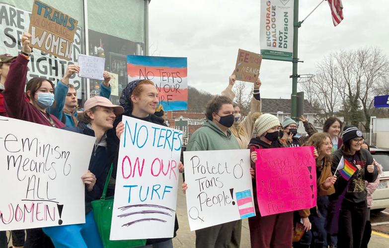 About 100 protest Artifacts for transphobic signage, business practices ...
