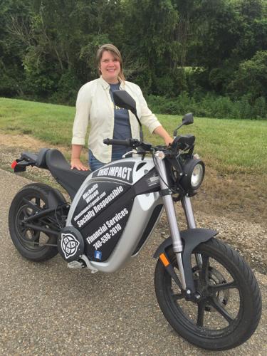 Local biz owner achieves an electric first with her motorcycle | Local ...