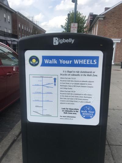 New uptown signs warn cyclists, skaters of new policy | Local News ...