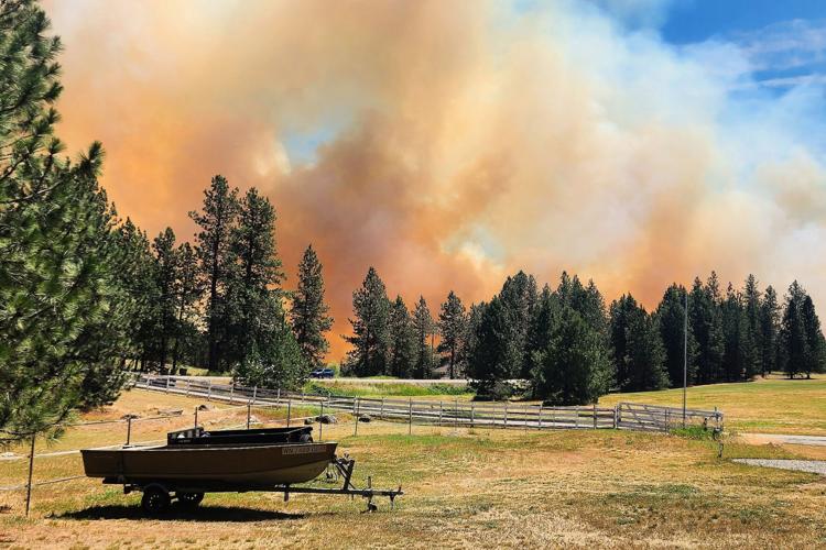 Eastern Washington wildfire forces evacuations and destroys homes ...