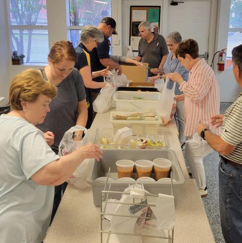 Rotarians package meals for Rise Against Hunger | News | athensreview.com