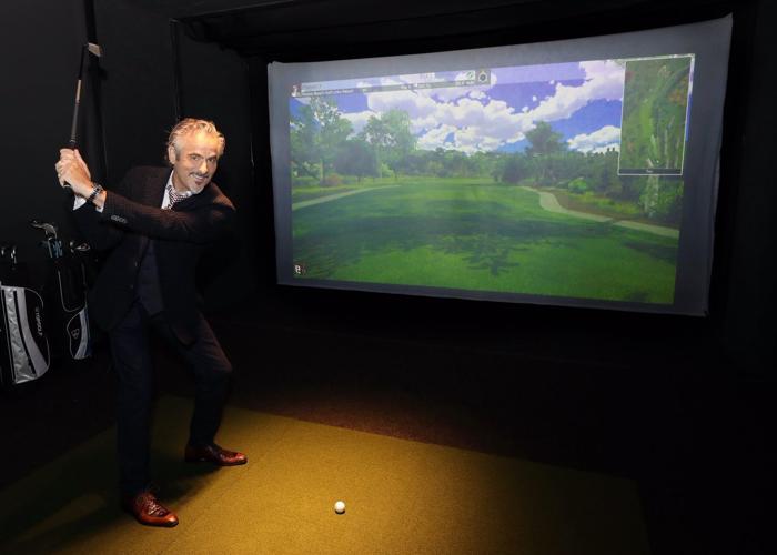 David Feherty takes a swing at Ocean Resort Casino's Top Golf Swing ...