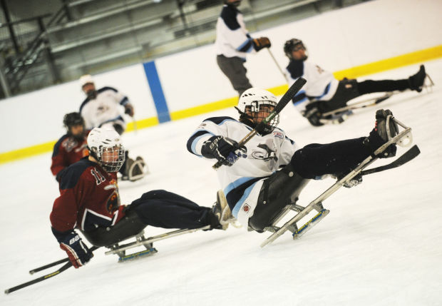 Gooley, Arnold lead CNY Flyers sled hockey team to tournament title