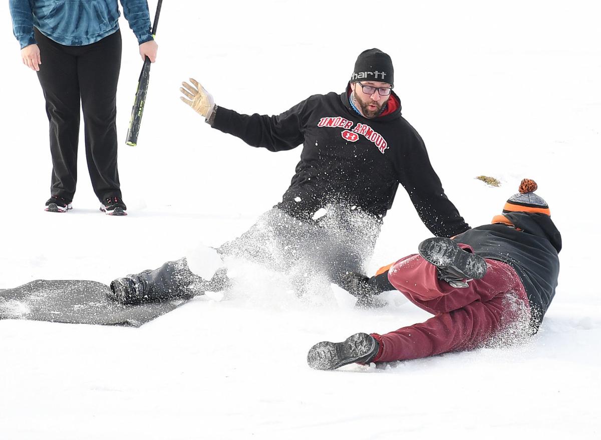 Auburn YMCA mentoring program gets boost from snow softball tourney