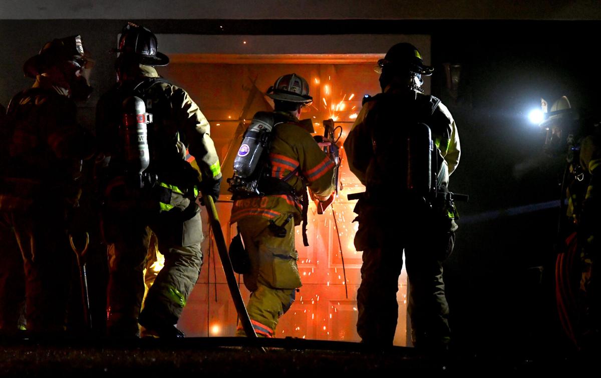 Cayuga County firefighters battle a basement fire in Fleming