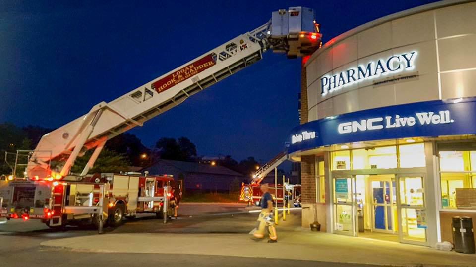 Auburn firefighters put out rooftop fire at Rite Aid