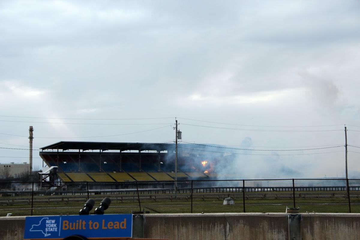 Crowd views demolition of New York State Fairgrounds grandstand ...
