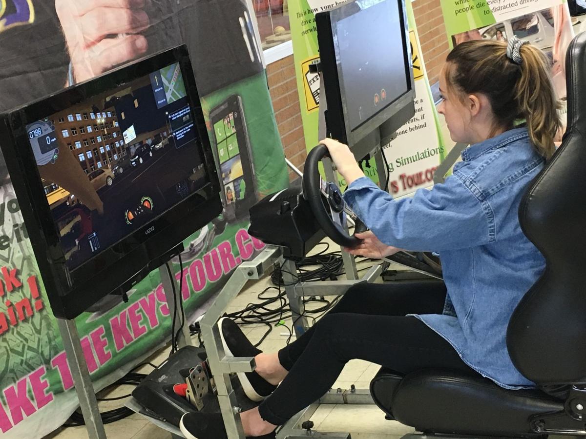 Students learn from drunk driving simulation at Auburn High School ...