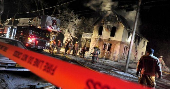 Updated: Lansing Street house fire caused by fireplace malfunction