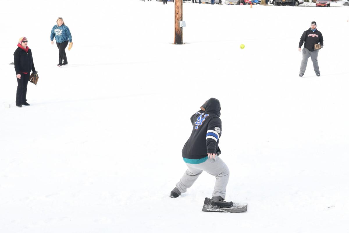 Auburn YMCA mentoring program gets boost from snow softball tourney