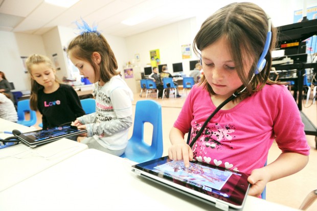 Tomorrow's textbooks: Elbridge Elementary students embrace 60 new iPads ...