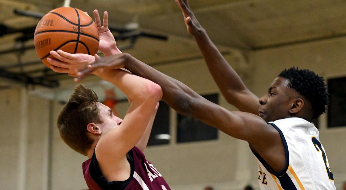 Gallery: Boys Basketball Player of the Year Kaleb Cook through the years